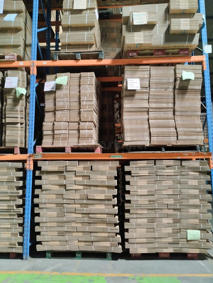 Stacks of Cardboard on Pallets Neatly Arranged on Shelves Stock Image ...