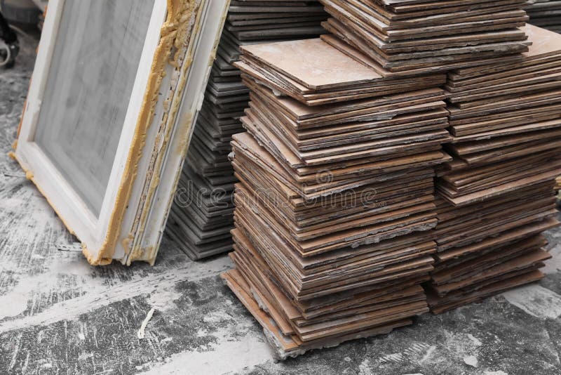 Stacks of Ceramic Tiles and Window on Grey Floor Stock Image - Image of ...
