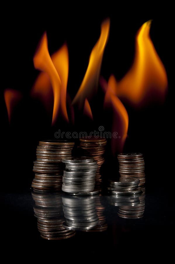 Stacks of Change on Fire stock image. Image of quarters - 18697763
