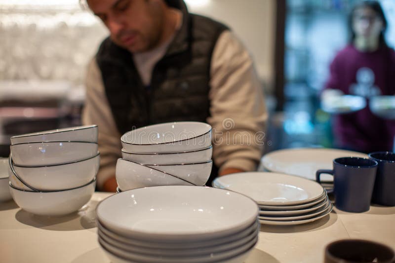 Chef Arranging Plates and Bowls in Restaurant Kitchen Stock Image ...