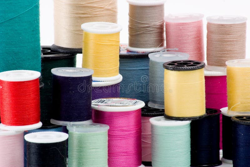 Stacks of Clothing Thread Spools Stock Photo - Image of isolated, black ...