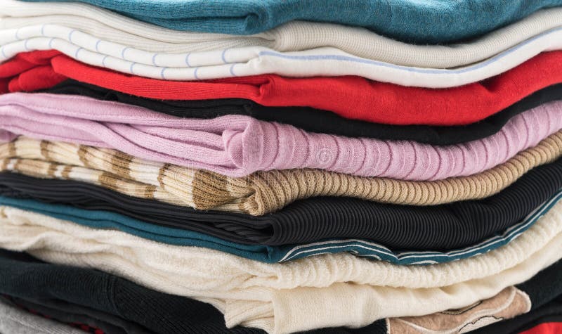 Stacks of Clothing on White Stock Image - Image of shirt, shirts: 97926139