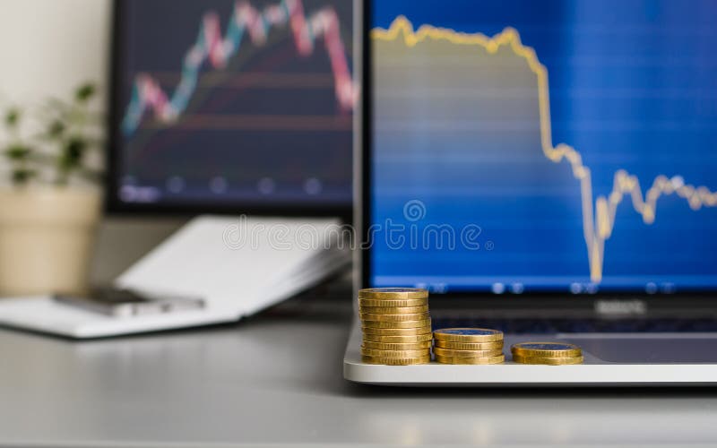 Stacks of Coins in the Form of a Decline Chart on the Background of ...