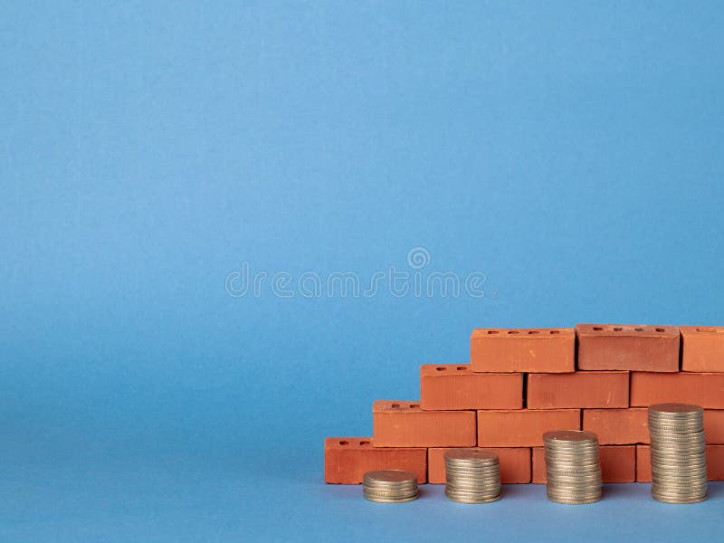Stacks of Coins in the Form of Steps Against a Background of Blocks of ...