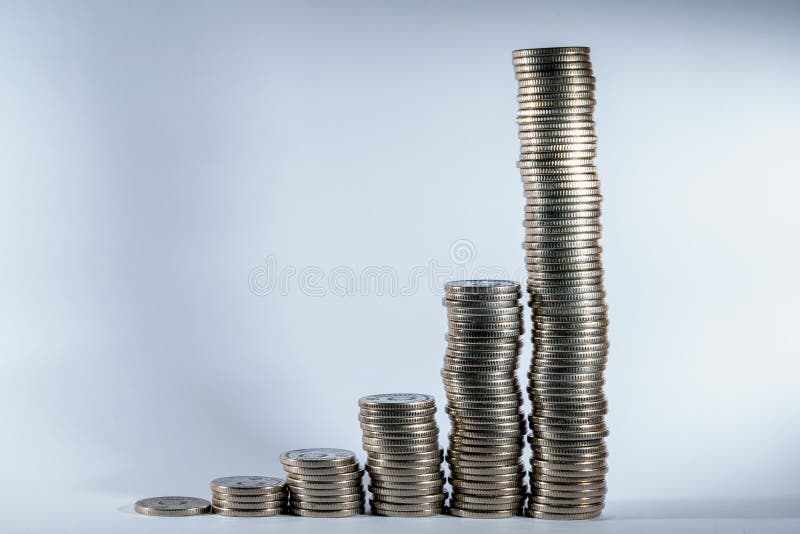 Stacks of Coins in a Growing Progression. Background with Copy Space ...