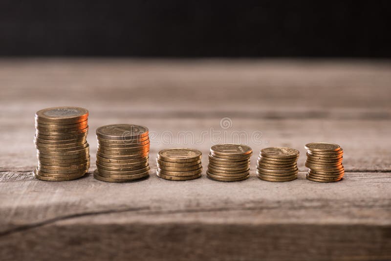 Coins on tabletop stock photo. Image of varied, great - 183436566