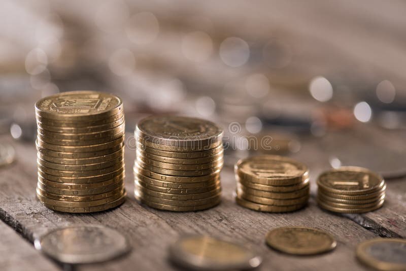 Coins on tabletop stock photo. Image of varied, great - 183436566