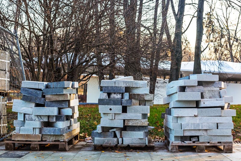 Stacks of Concrete Curbstone are Stacked in a Park on Asphalt Stock ...