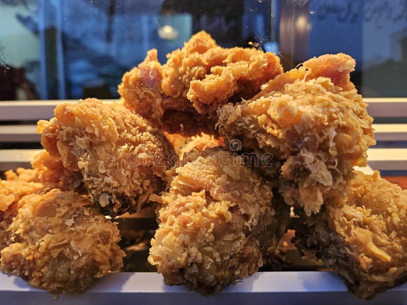 Stacks of Crispy Chicken are Displayed in the Display Stock Image ...