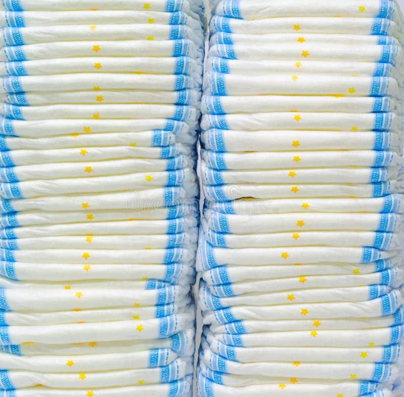 Stacks of Diapers Stacked in Staggered Rows on a White Background Stock ...