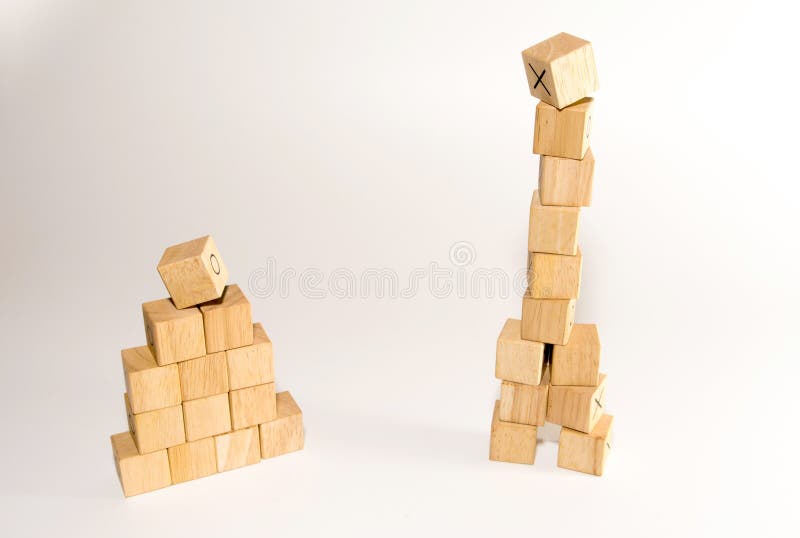 The Stacks of Rectangular Wooden Cubes To Be Two Stacks, One High and ...