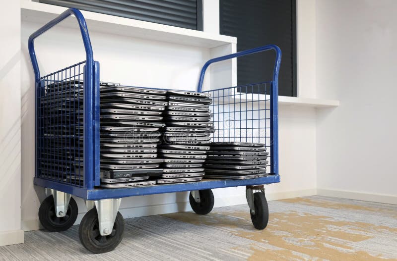 Stacks of Discarded Laptops, Notebooks on a Trolley Stock Image - Image ...