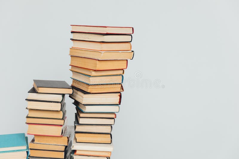 Stacks of Educational Books for Learning on a White Background Stock ...