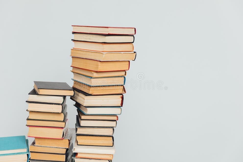 Stacks of Educational Books for Learning on a White Background Stock ...