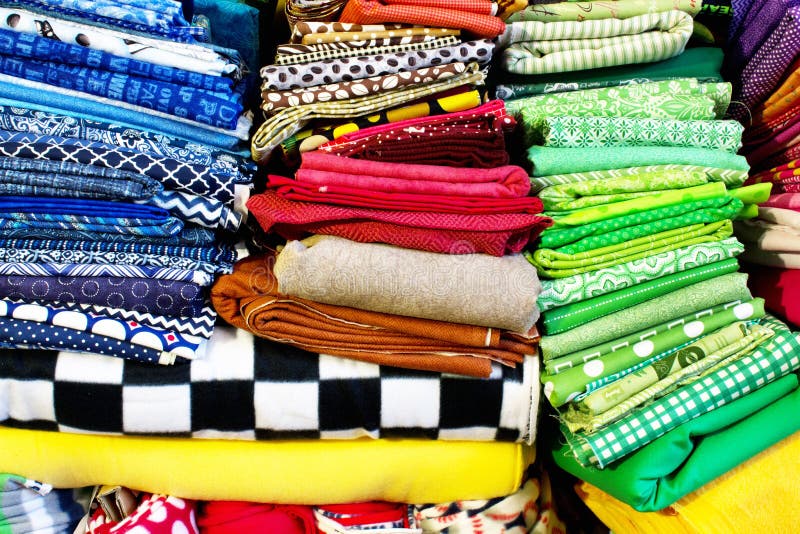 Stacks of Fabric Leaning Against Each Other Stock Photo - Image of ...