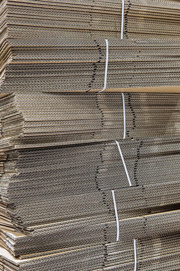 Stacks of Folded Cardboard Boxes in a Warehouse or in a Store Stock ...
