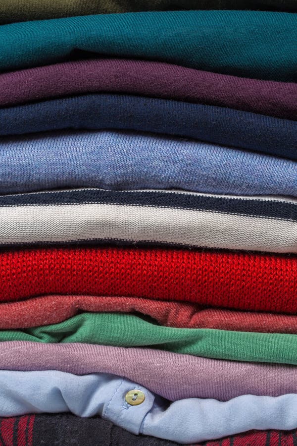 Stacks of Folded Clothes, Close Up Stock Image - Image of color ...