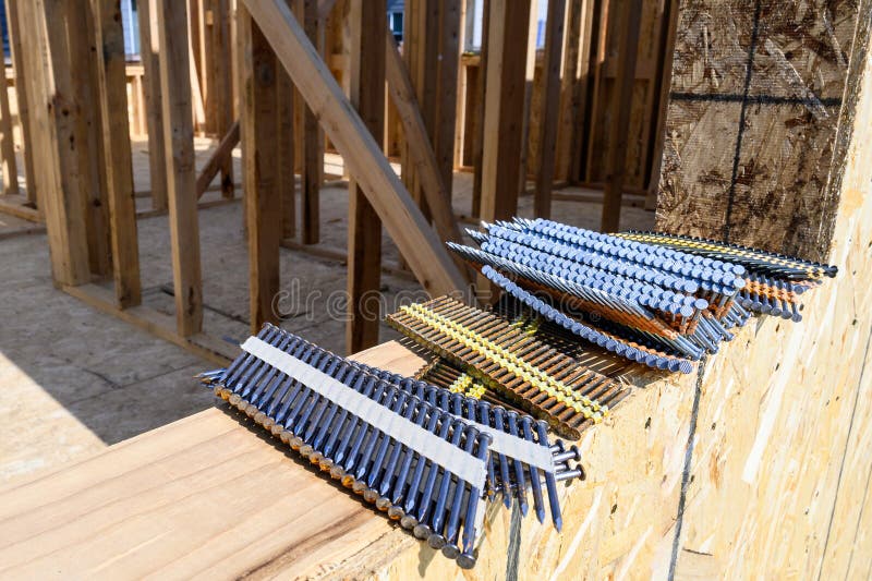 Stacks of Framing Nails Sitting on the Windowsill of a House Under ...