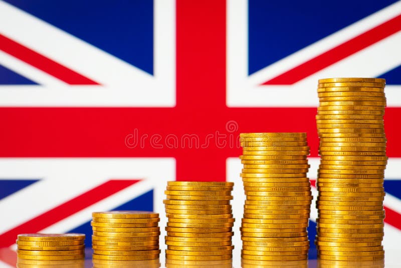 Stacks of Gold Coins in Front of Great Britain Flag Stock Photo - Image ...