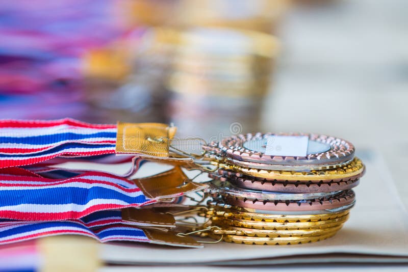 Stacks of Gold, Silver, and Bronze Medals Stock Image - Image of field ...