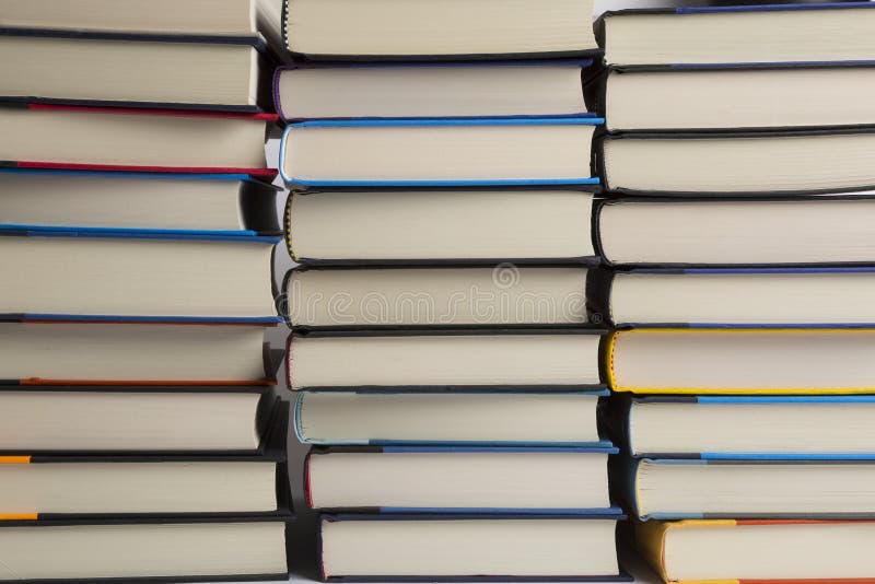 Stacks of Hardback Books Background Piled High. Reading Concept. Copy ...