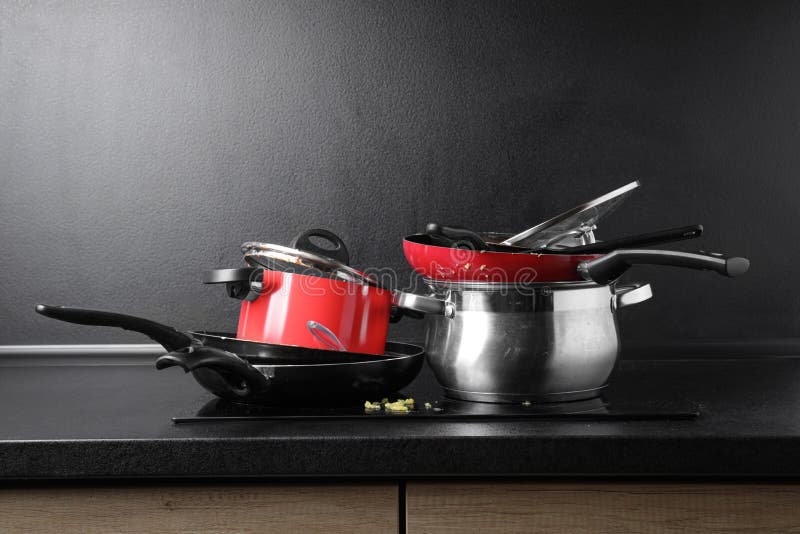 Stacks of Dirty Kitchenware on Cooktop in Kitchen Stock Photo - Image ...