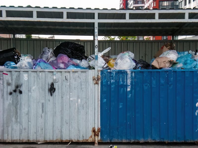 Stacks of Litter Bags Overflow Trash Cans. Dumpsters Being Full with ...