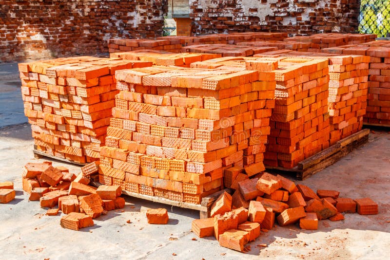 Stacks of New Red Brick at Construction Site Stock Photo - Image of ...