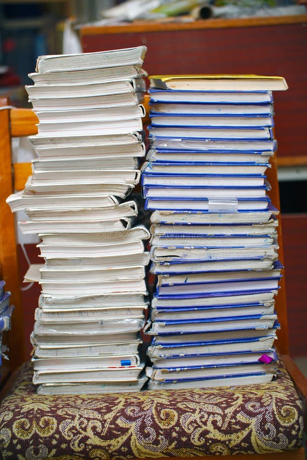 Stacks of Old Books on a Chair in the Library Stock Image - Image of ...