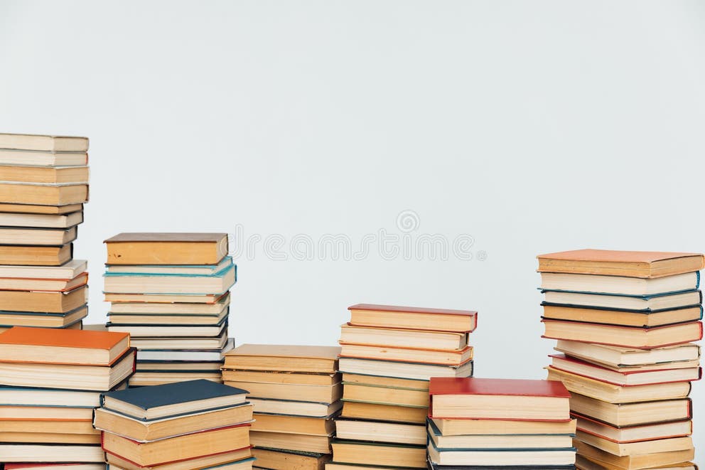 Stacks of Old Educational Books on a White Background of a School ...