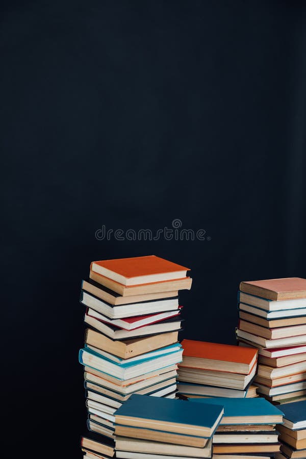 Stacks of Old Library Books on a Black University Background Stock ...