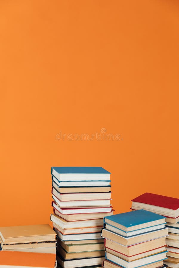 Stacks of Old Library Books on an Orange University Background Stock ...