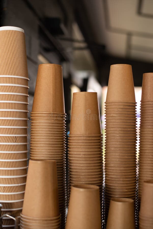 Stacks of Paper Brown Cups for Coffee. Craft Cups for Coffee Stock ...