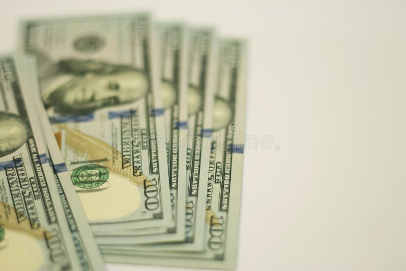 Stacks of Paper 100 Dollars USA on the White Background Stock Image ...