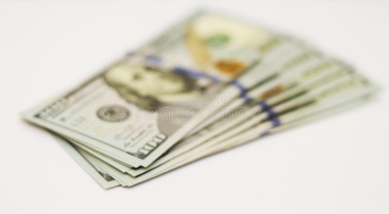 Stacks of Paper 100 Dollars USA on the White Background Stock Photo ...