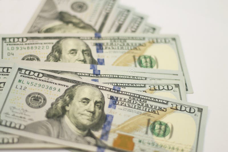 Stacks of Paper 100 Dollars USA on the White Background Stock Image ...