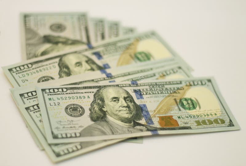 Stacks of Paper 100 Dollars USA on the White Background Stock Photo ...