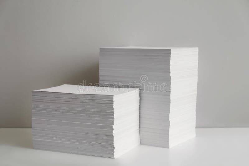 Stacks of Paper Sheets on White Table Stock Image - Image of business ...