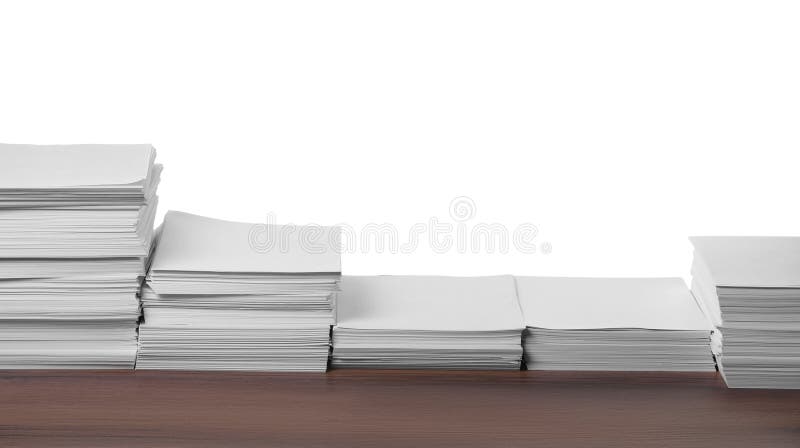 Stacks of Paper Sheets on Wooden Table Against White Background Stock ...