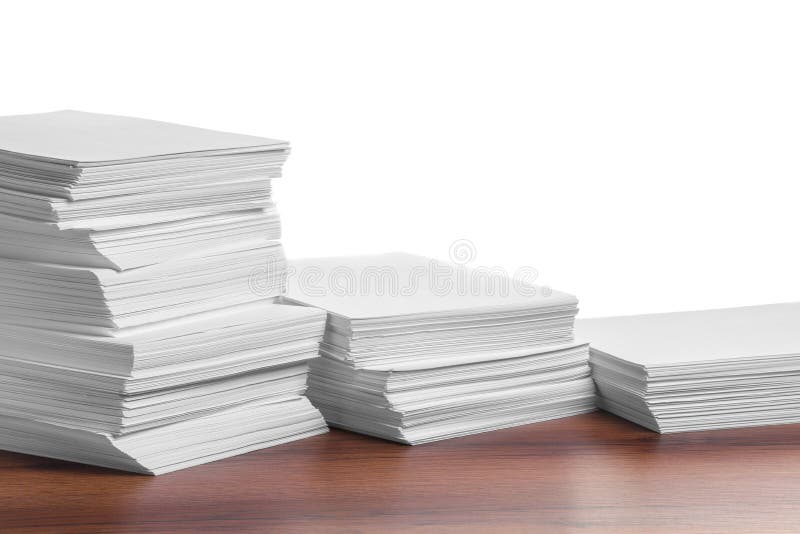 Stacks of Paper Sheets on Wooden Table Against White Background Stock ...