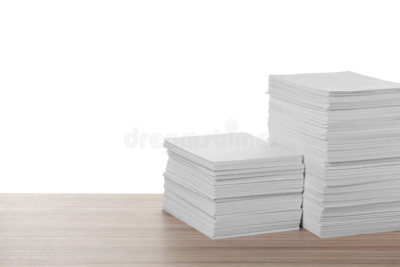 Stacks of Paper Sheets on Wooden Table Against White Background. Space ...