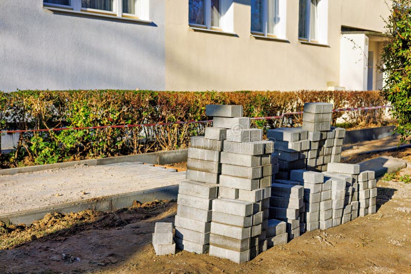 Stacks of Paving Slabs in Front of the Pedestrian Path of the House ...