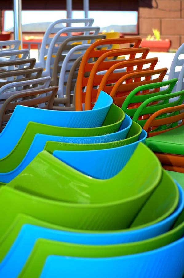 Stacks of plastic chairs stock image. Image of rest, backrests - 66678709