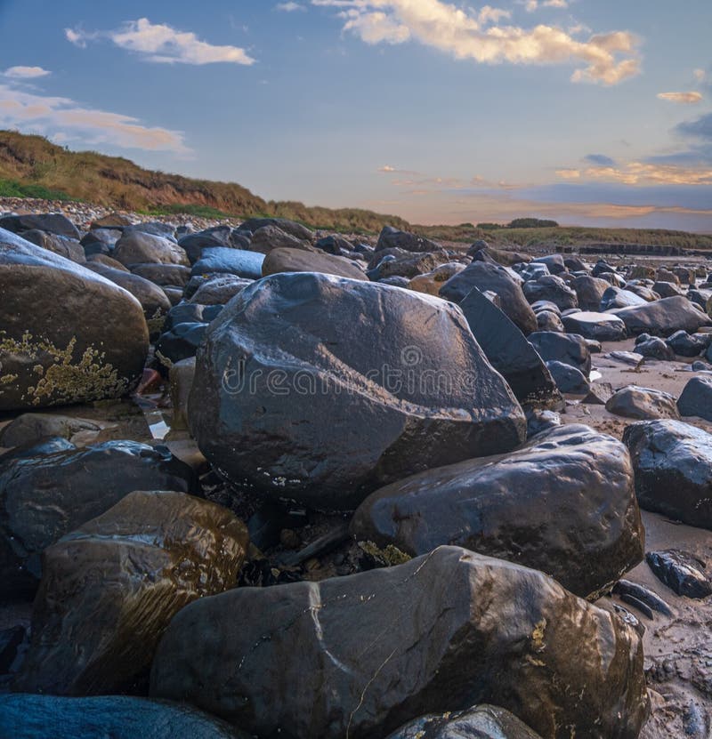 Stacks of Rocks in Different Shapes and Sizes on the Beach Stock Image ...