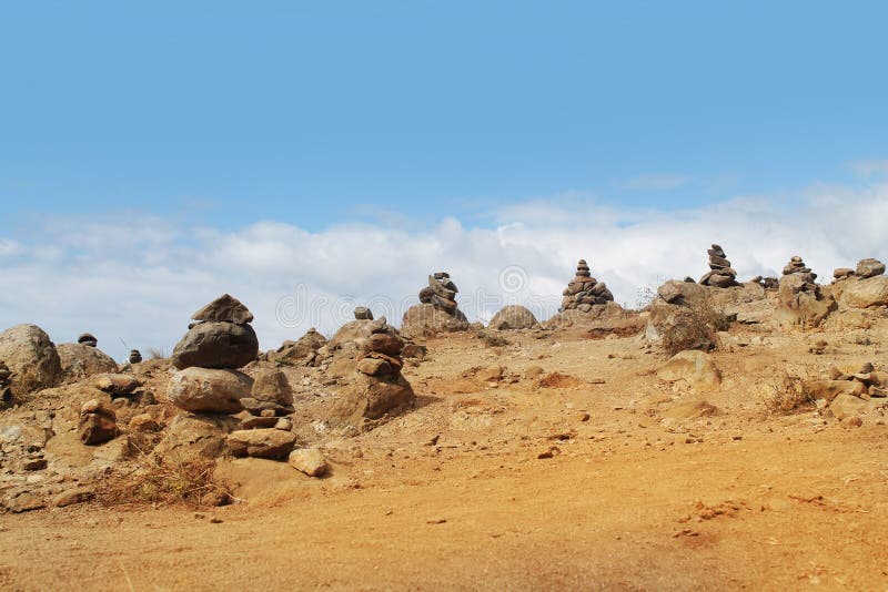 Stacks of Stones on Sand Desert Stock Image - Image of stones, distant ...