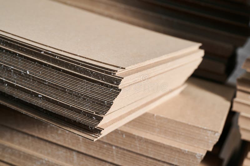 Stacks of Thick Paperboard Ready for Cardboard Box Manufacturing in a ...
