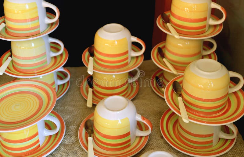 Stacks of Multicolor Cups and Saucers Ready for Break Time Stock Image ...
