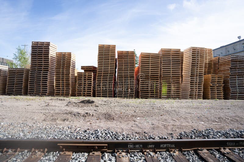 Stacks of Wood Pallets in a Factory Stock Image - Image of business ...