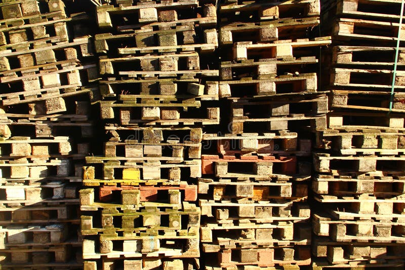 Stacks of Wooden Pallets in a Warehouse Stock Image - Image of ...