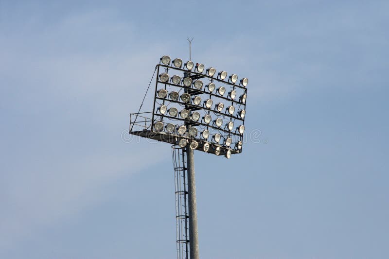 Stadium lighting poles. stock photo. Image of bright - 83576142